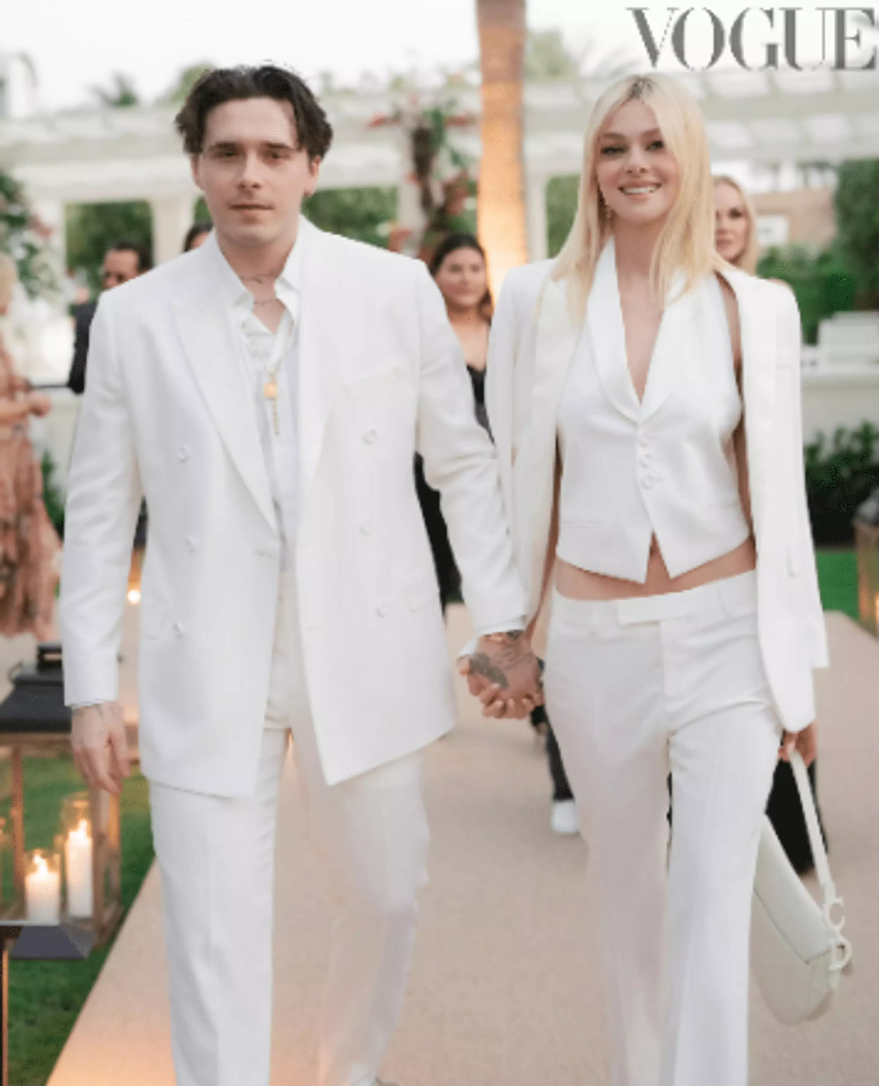 Tá grianghraif agus sonraí nua foilsithe ag British Vogue ó bhainis Brooklyn Beckham agus Nicola Peltz