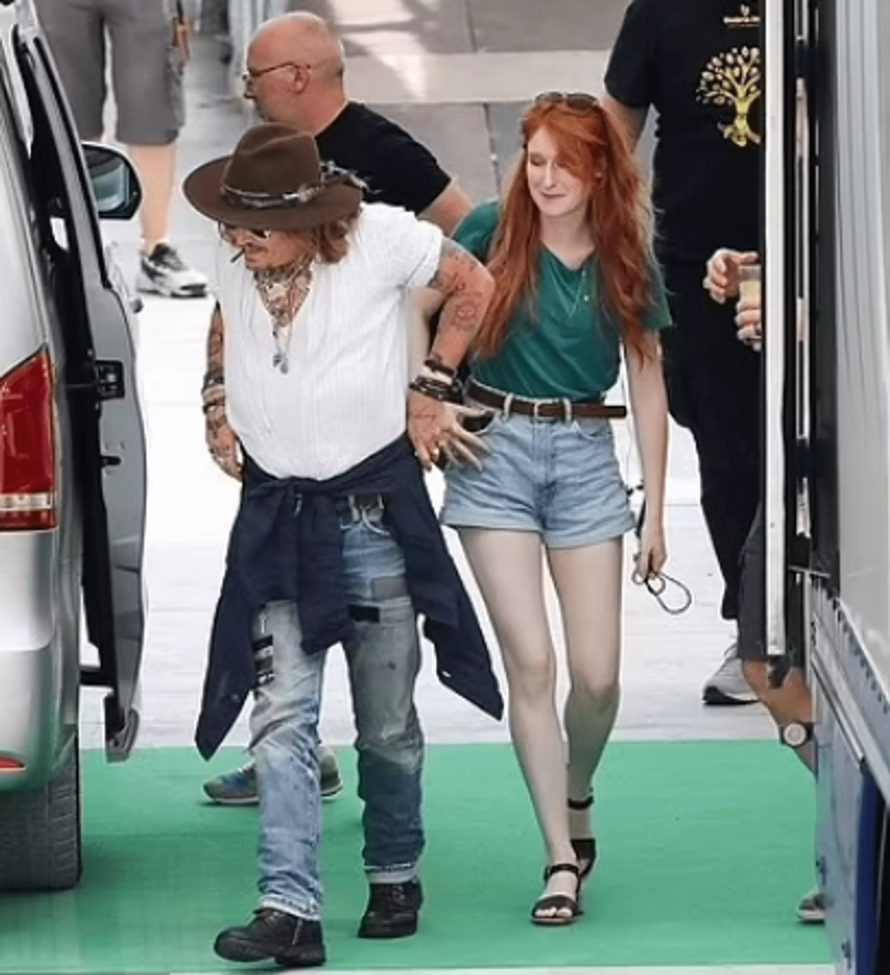 Johnny Depp reisde naar Italië met een onbekende vrouw met rood haar